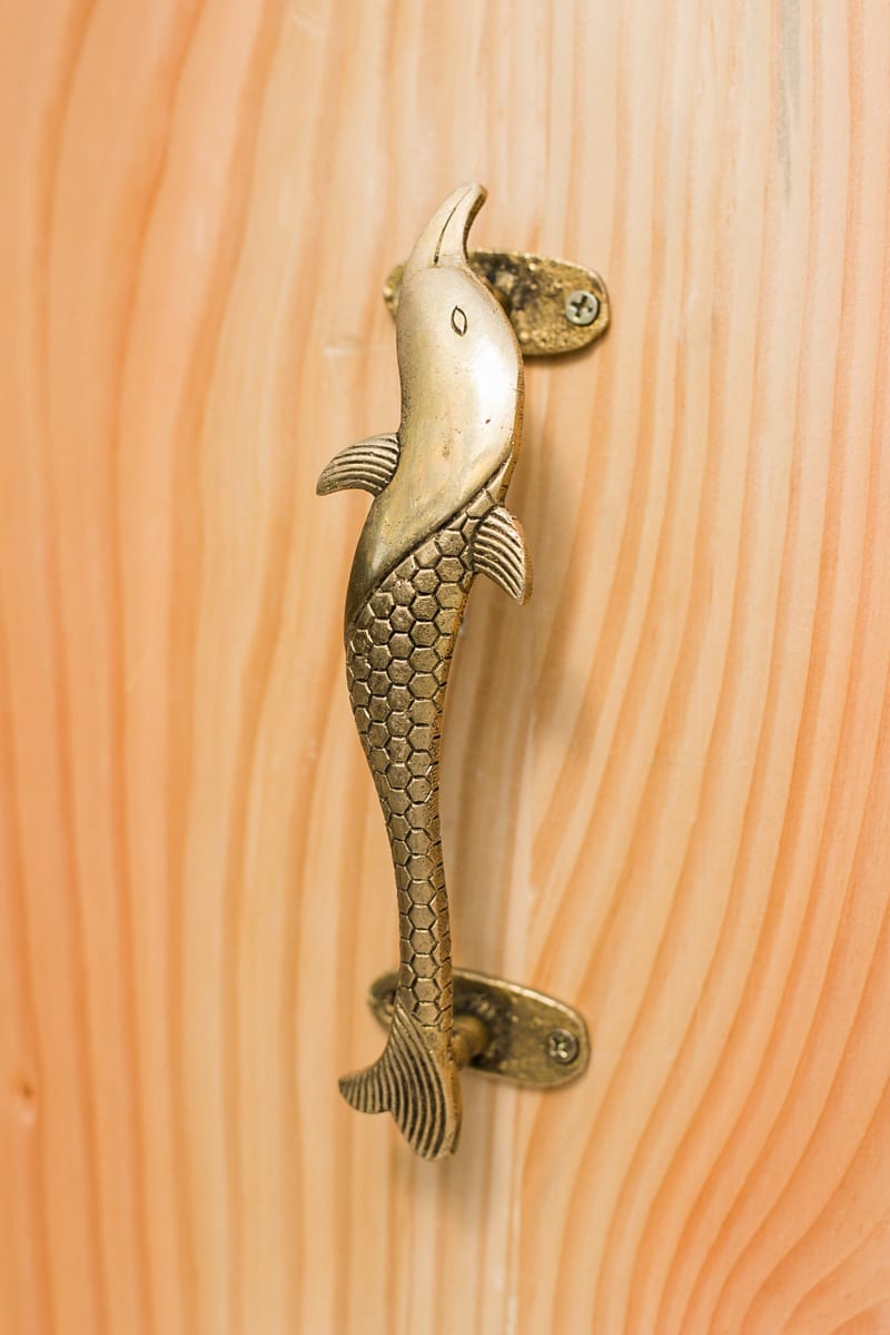 manilla bronce delfin